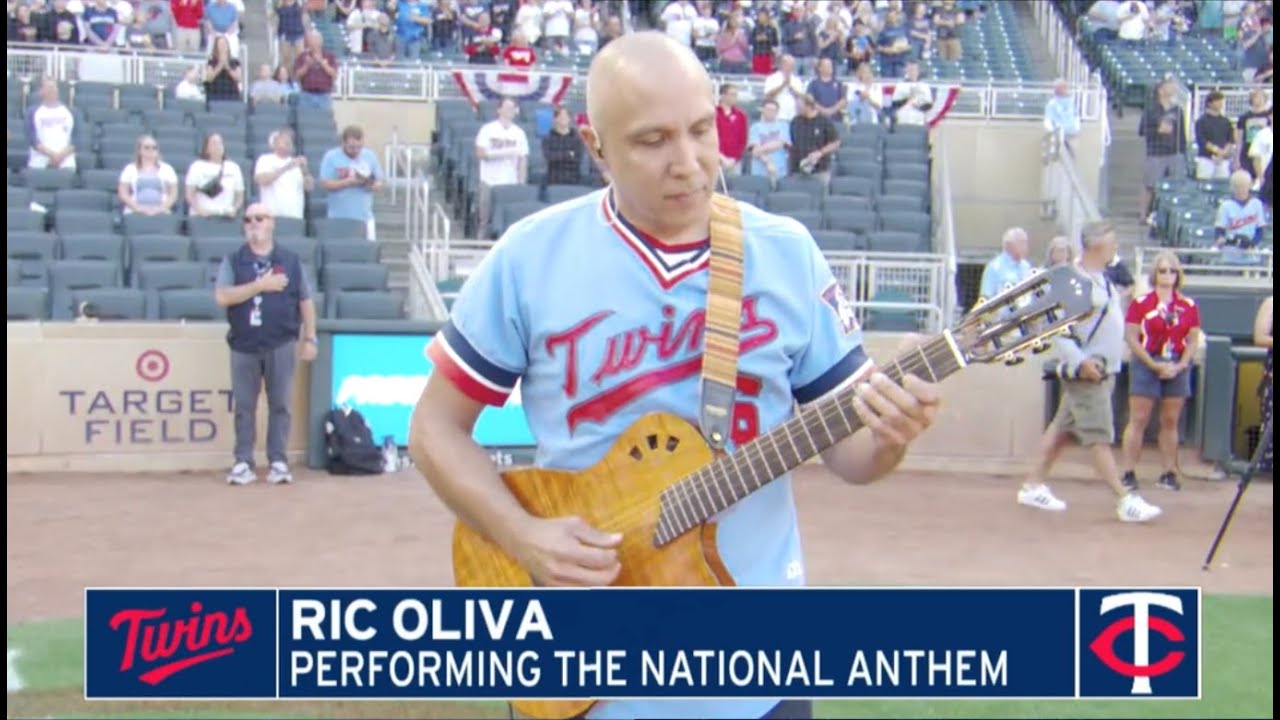Ric Oliva performs the Star Spangled Banner at the Minnesota Twins Game ...