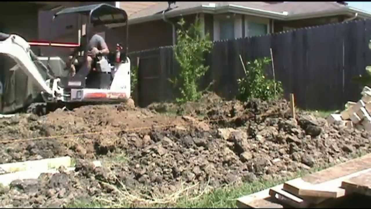 Mini bobcat Excavator Digging Patio - YouTube
