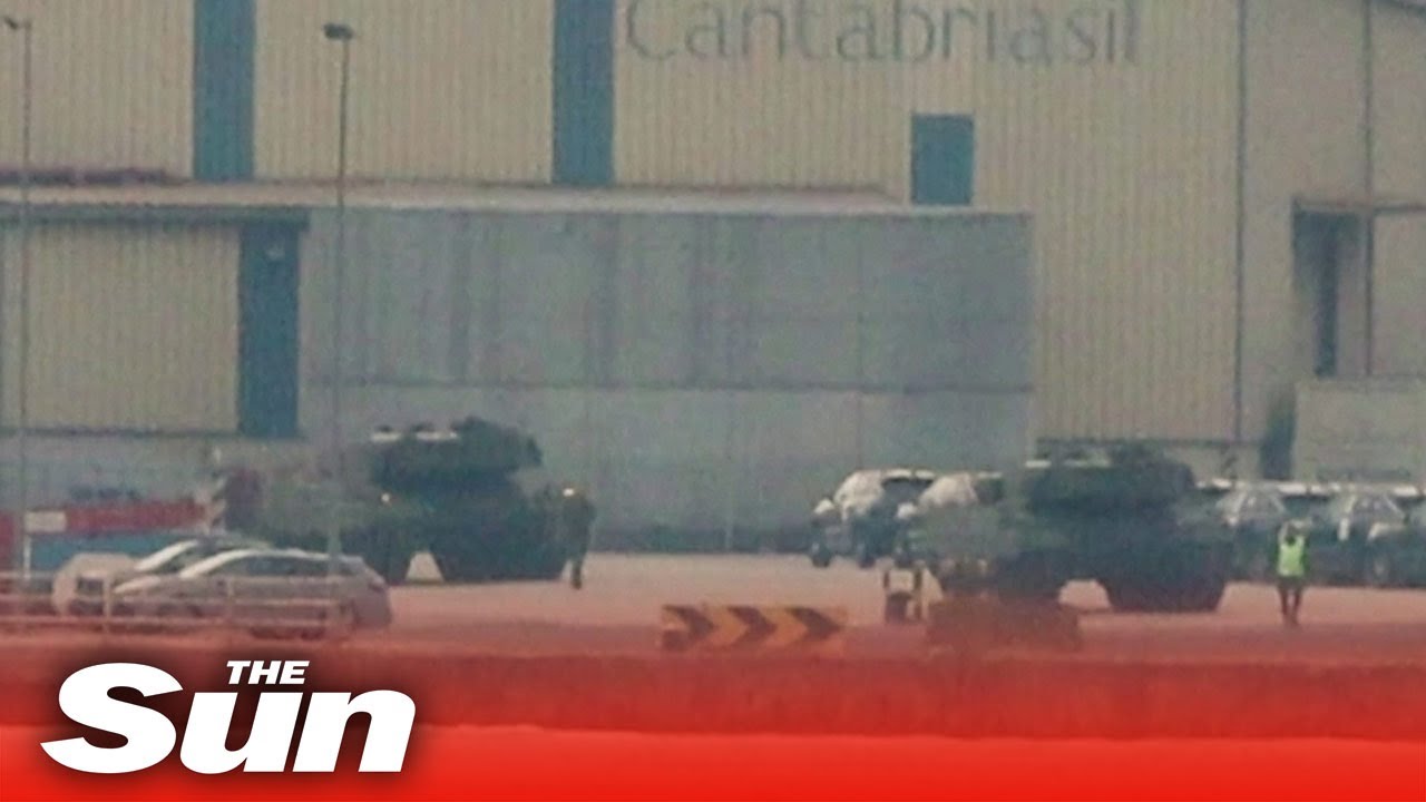 Six Ukraine-bound Spanish Leopard tanks leave Santander port - YouTube