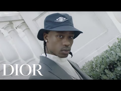 Travis Scott models the Air Dior line
