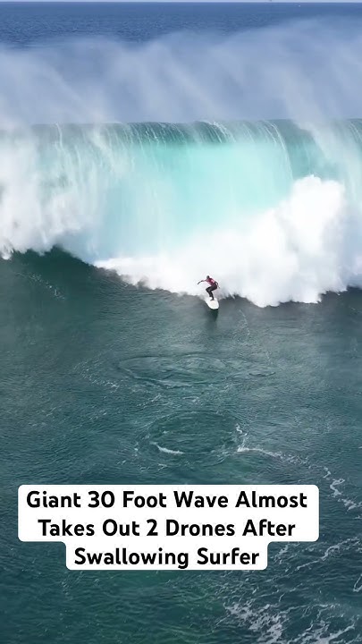 30 foot wave takes out surfer and almost 2 drones! - YouTube