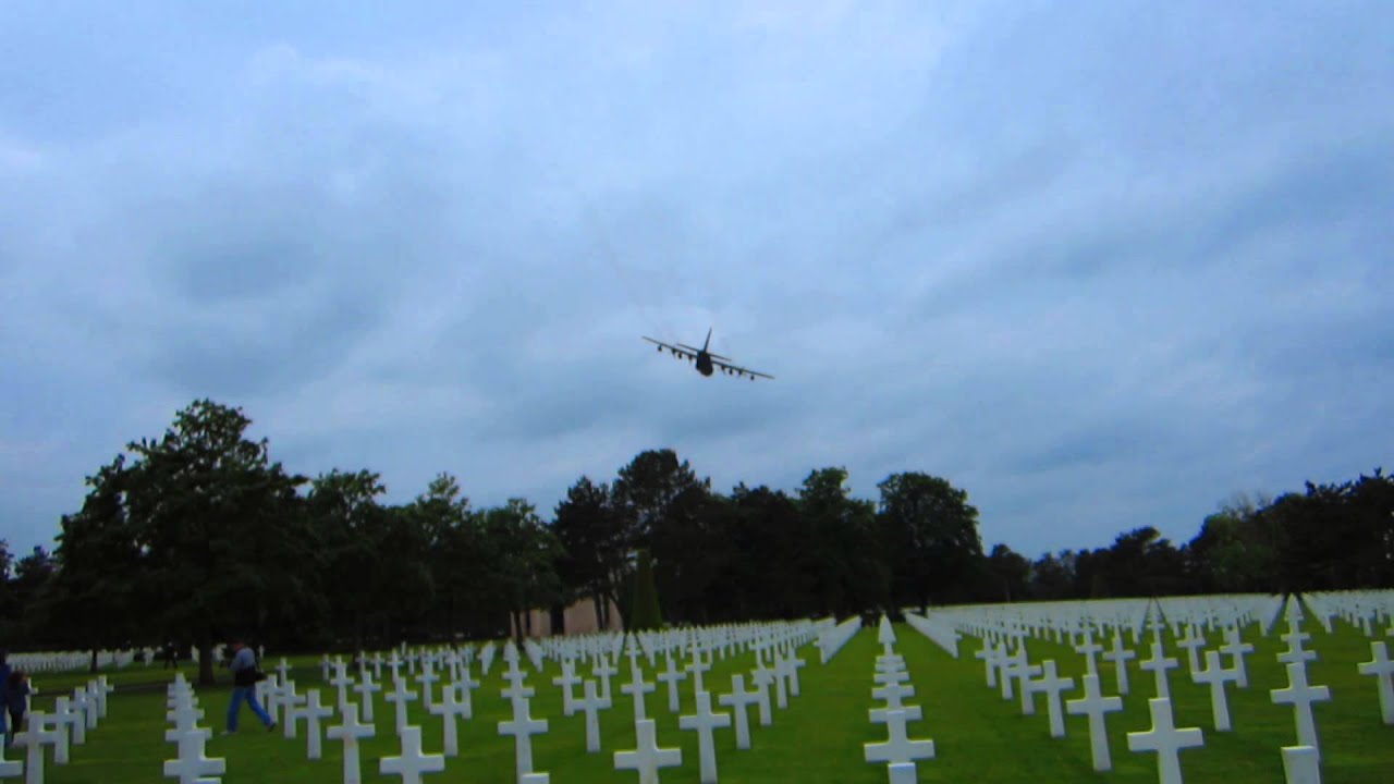 Plane Flying Over Normandy Beach Cemetery - YouTube