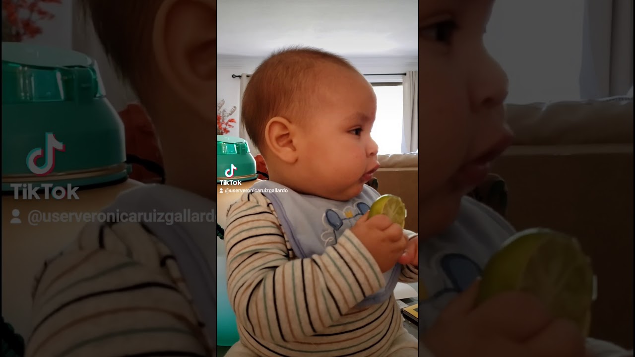 Baby enjoys eating a lime 😋 - YouTube