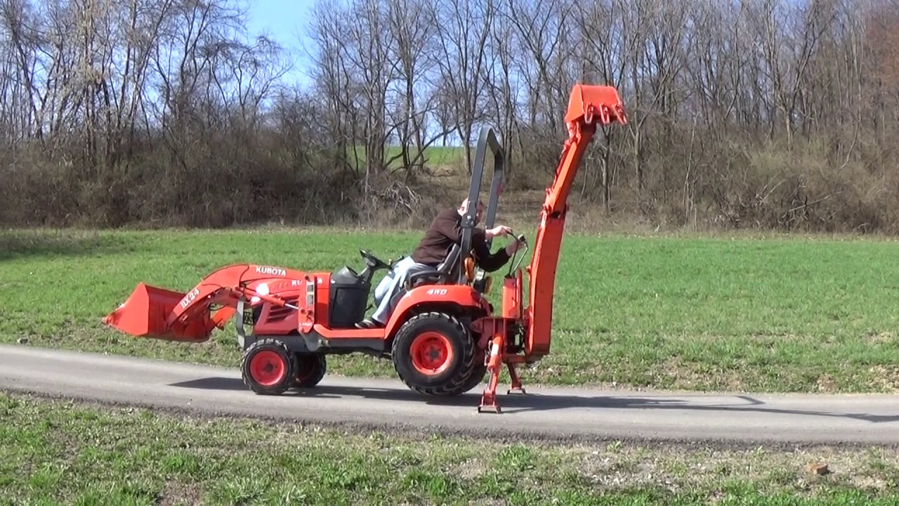 2007 KUBOTA BX24 WITH LOADER, BACKHOE, AND R4 TIRES - YouTube