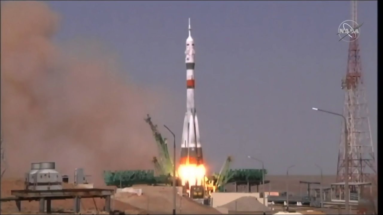 Soyuz rocket launches joint US-Russian crew to space station - YouTube