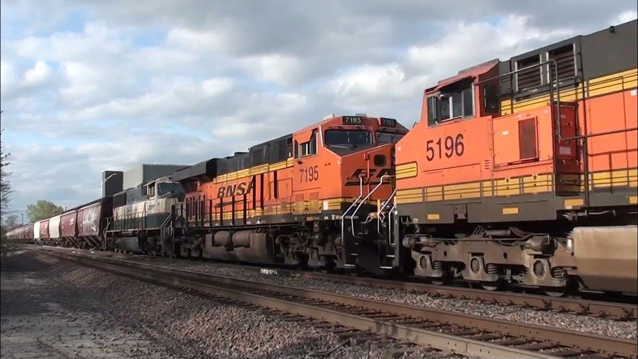 BNSF #8045 Leads WB Grain Train with Executive MAC and SP&S Heritage Hopper. Olathe, KS 4/22/23 ...