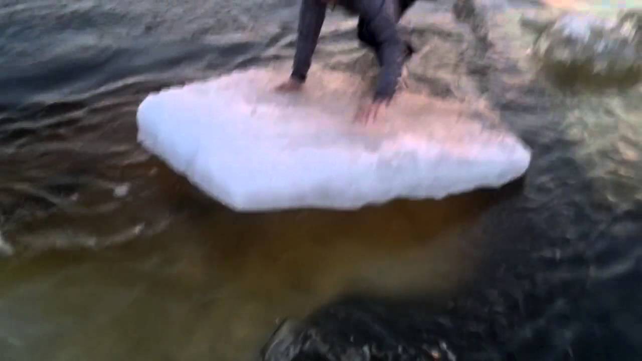 Guy Slips off Ice and Into Water - YouTube