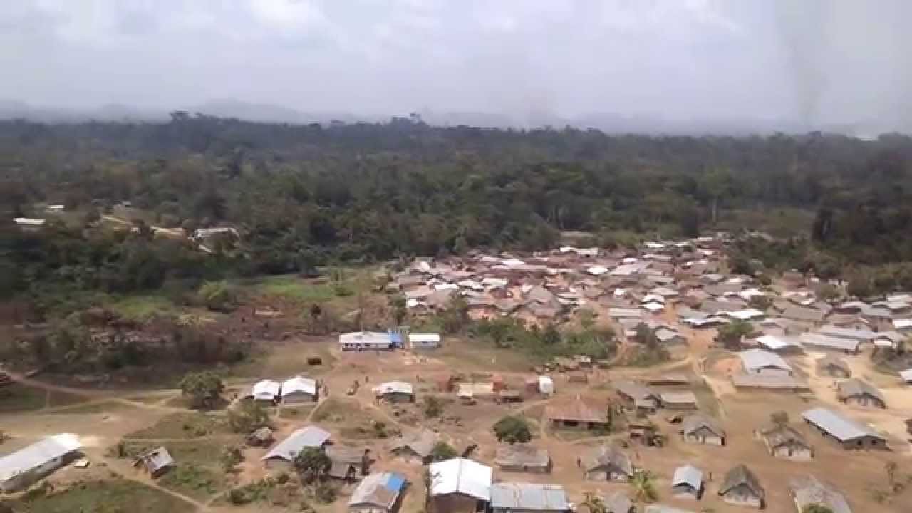 Helicopter ride over remote African village - Gbarpolu, Liberia - YouTube