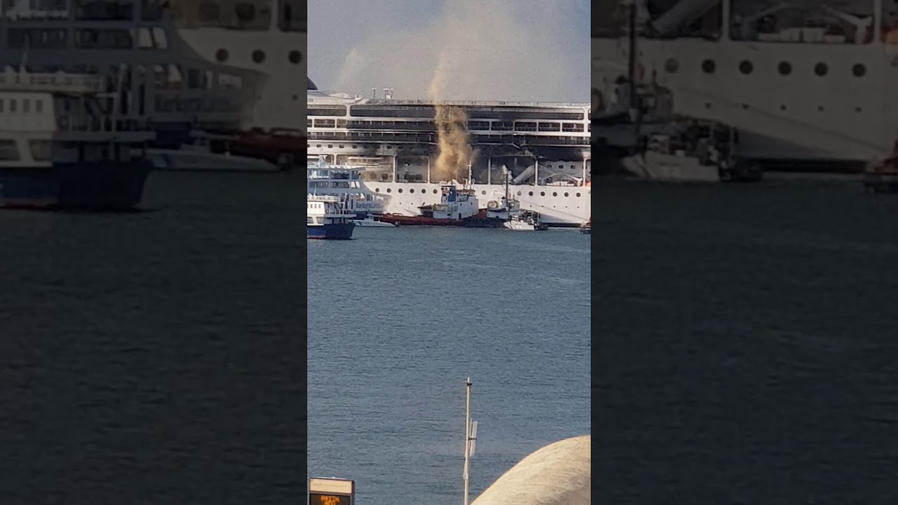 Cruise Ship Smoulders in Aftermath of Fire at Corfu Port - YouTube