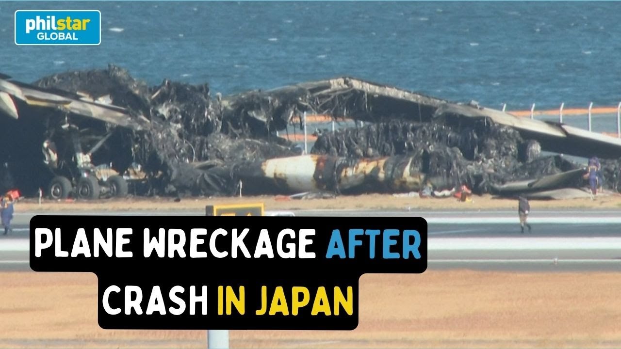 Plane wreckage after crash at Japan's Haneda airport - YouTube
