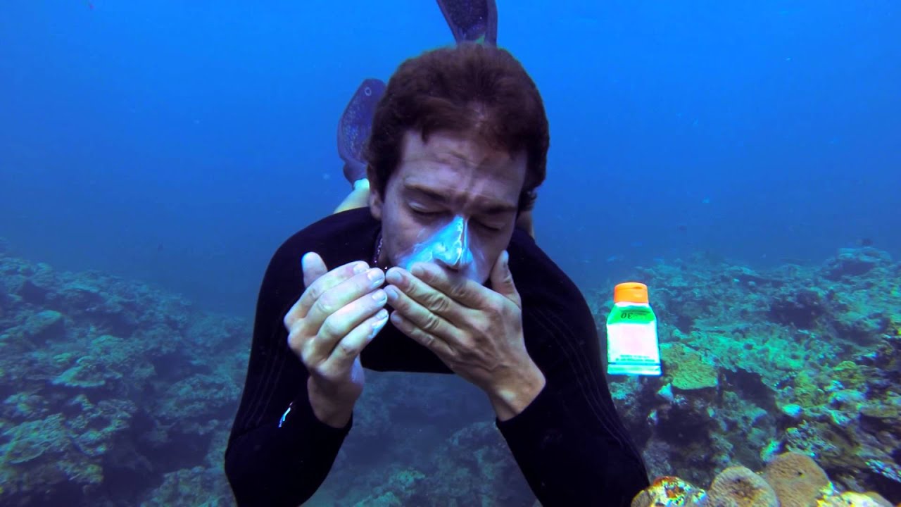 Raw Elements sunscreen underwater application while spearfishing - YouTube