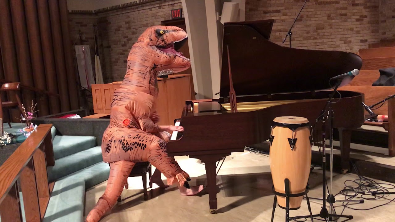 T. rex playing Jurassic Park Theme - YouTube