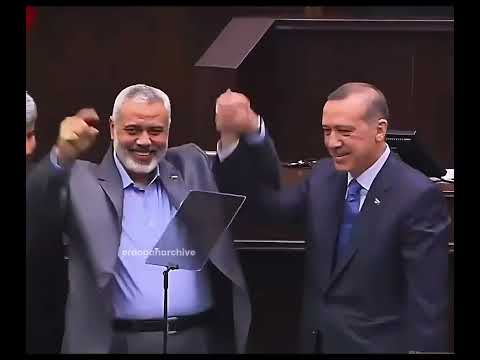 ERDOĞAN 2012 YILINDA AK PARTİ GRUP TOPLANTISINDA KONUŞURKEN ŞEHİT İSMAİL HANİYE SALONA GİRİYOR