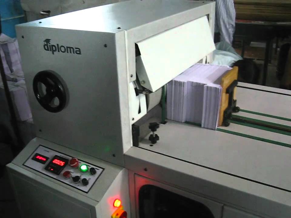 Pressing and Stacking of folded signatures - YouTube