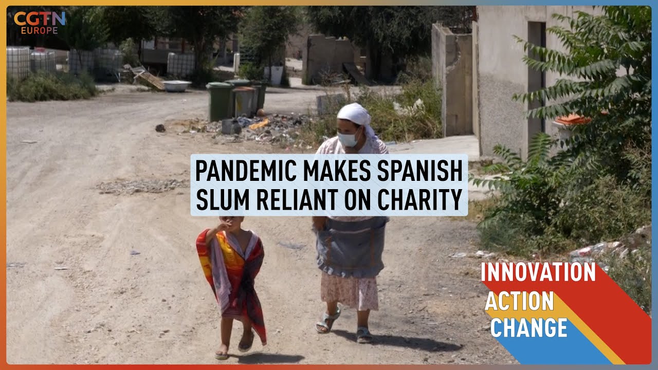 Pandemic makes Spanish slum reliant on charity - YouTube
