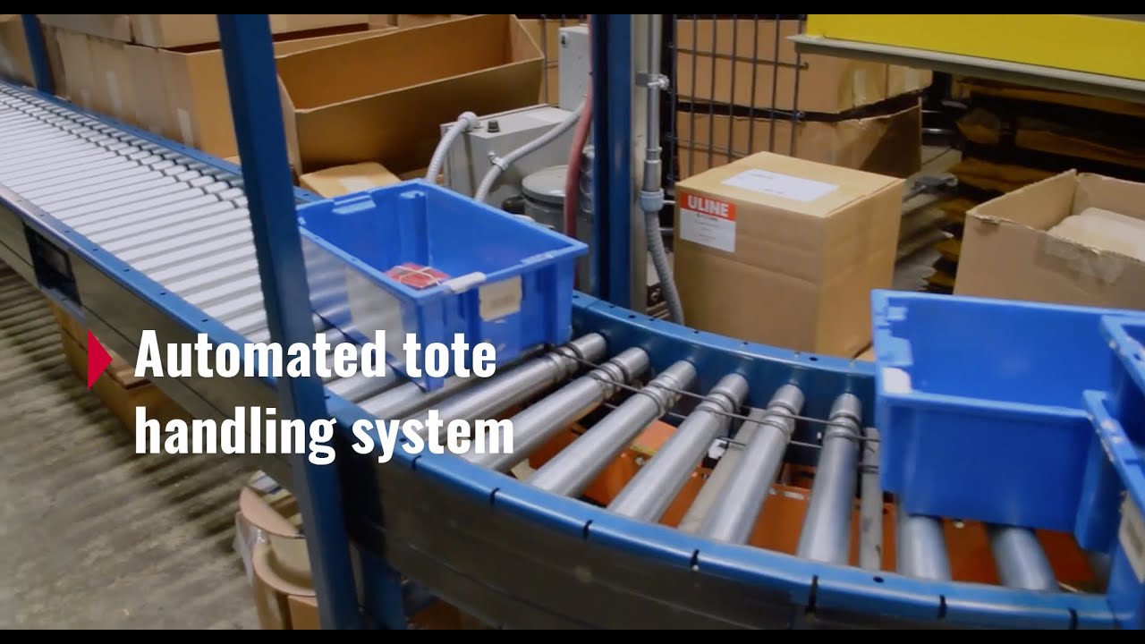 Automated tote handling system - YouTube