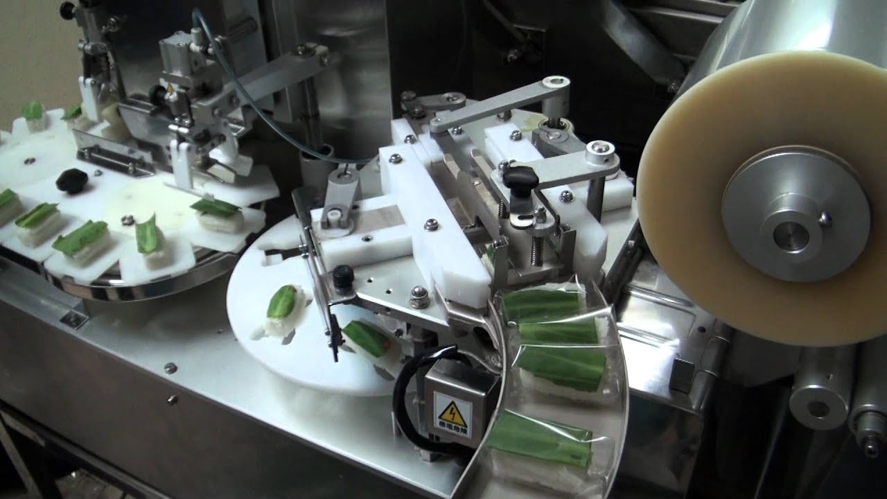 Suzumo SGP auto sushi packing machine used - YouTube