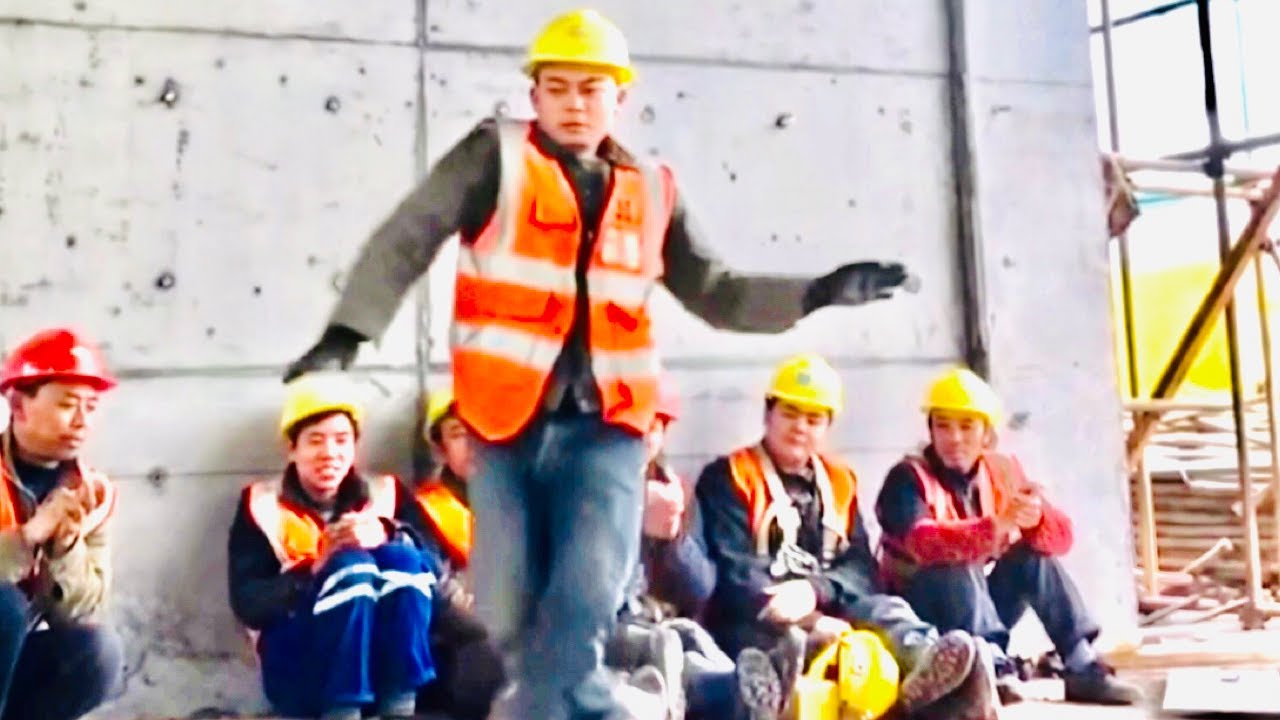 China: Cool Videos: The Dancing Construction Worker - YouTube