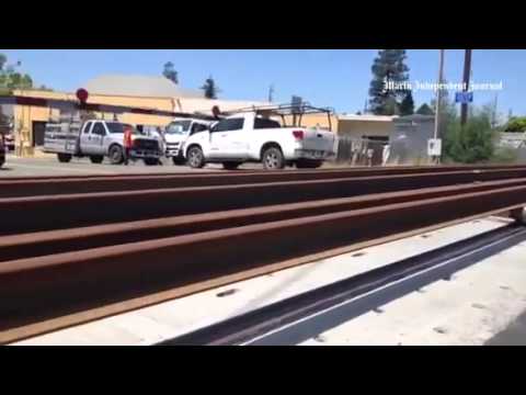 Long sections of track for the SMART train rolls through Novato on ...