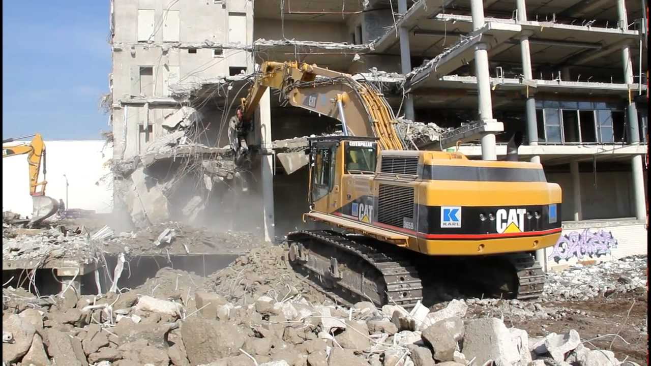 Caterpillar CAT 365B L with the short boom of a Komatsu PC450 - YouTube