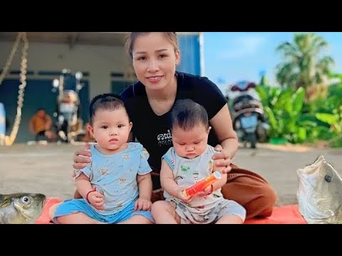 Single mom - Picks up bananas to sell_ catches fish in the deep forest to raise 2 small children