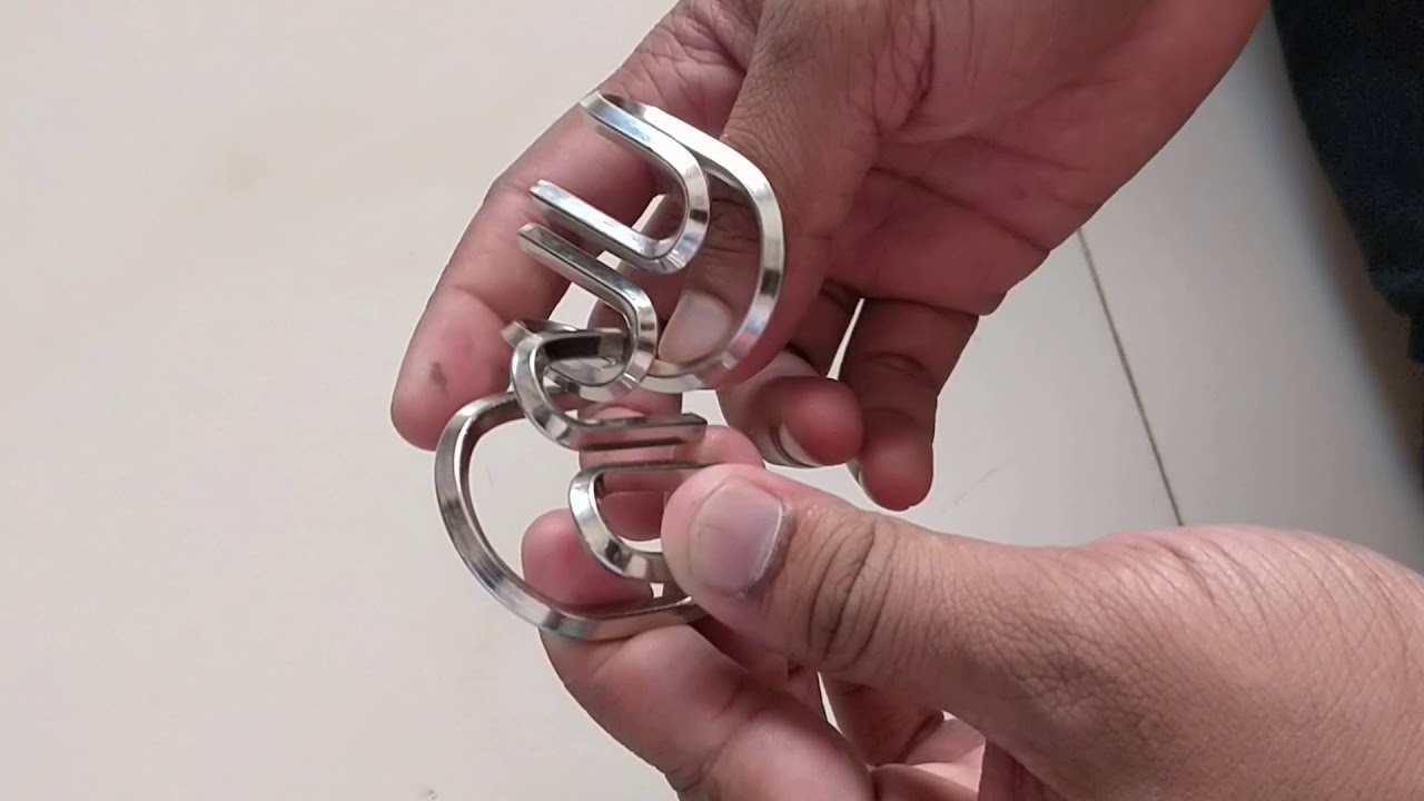 Solving the M or Double U metal puzzle - YouTube