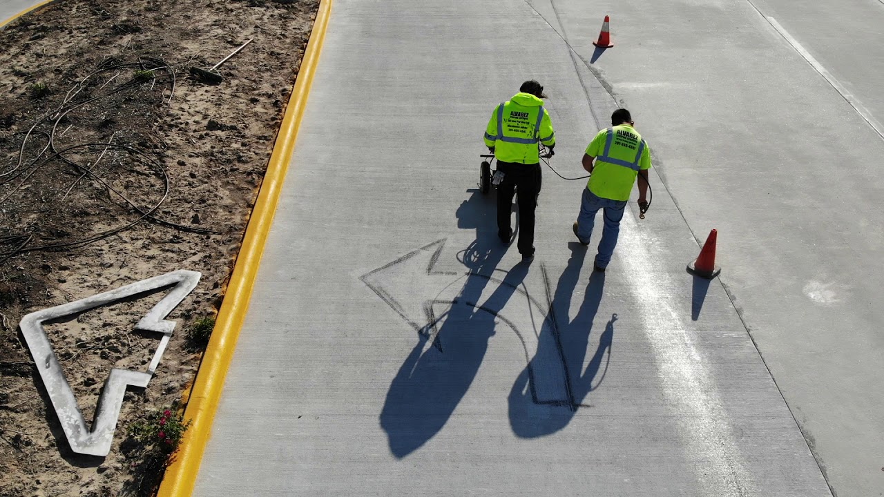 Alvarez Striping thermoplastic turn lane from above - YouTube