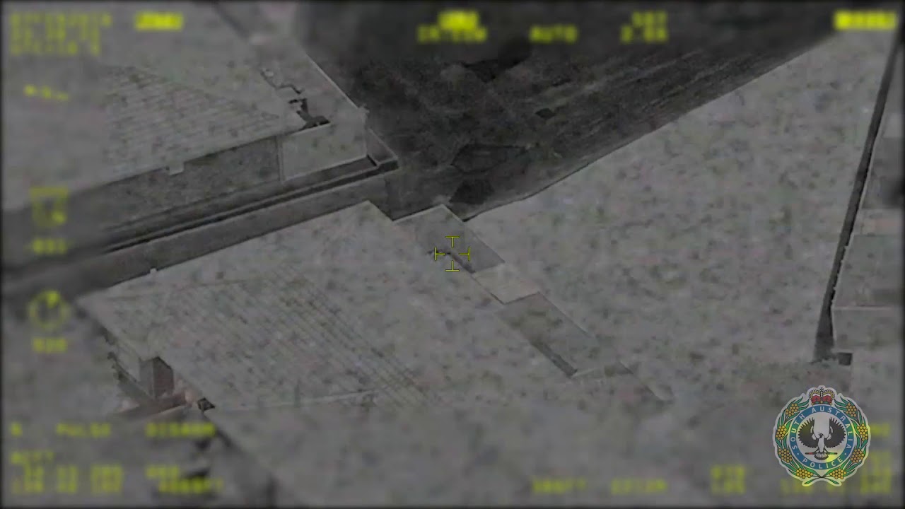 Man arrested after laser pointer directed at SAPOL helicopter - YouTube