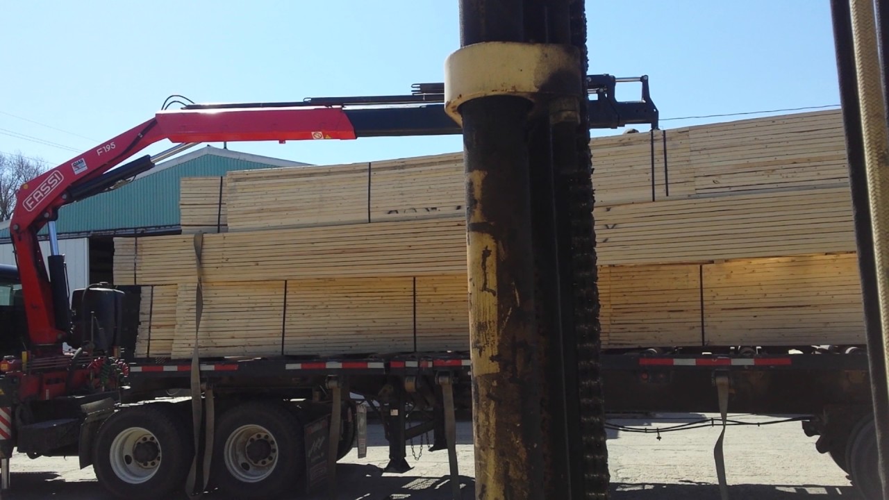 Boom unloading trusses - YouTube