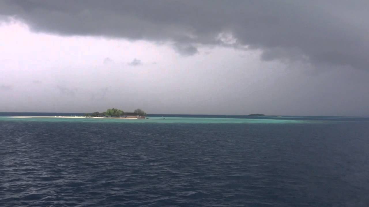 Maldives Maldives Vavuu Atoll storm cloud approaching - YouTube