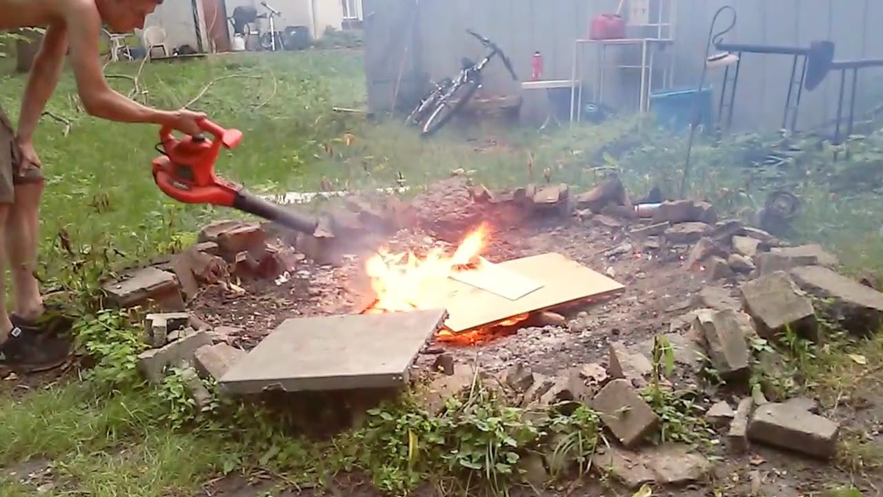 Leaf blower getting the fire growing - YouTube