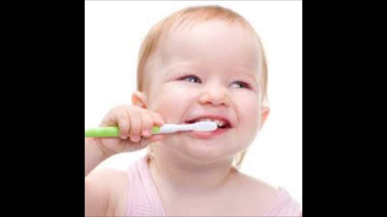 Brushing Baby Teeth | How To Clean Babies Teeth - YouTube