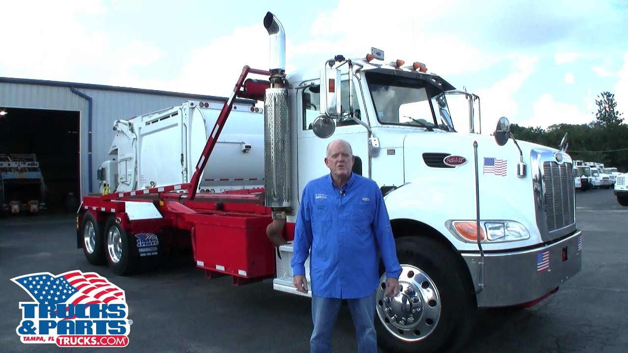 2008 Peterbilt 340 with American Roll Off Hoist - YouTube