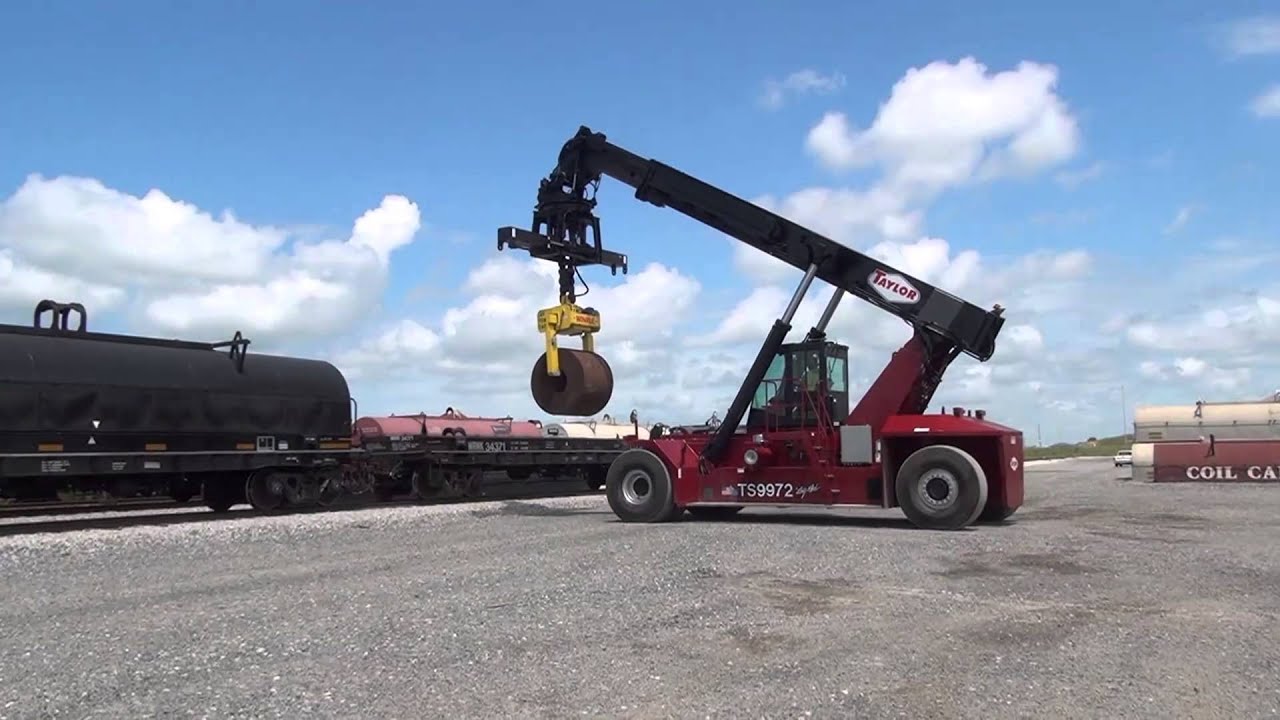 Taylor Reachstacker with Winkle Coil Handling Attachment - YouTube