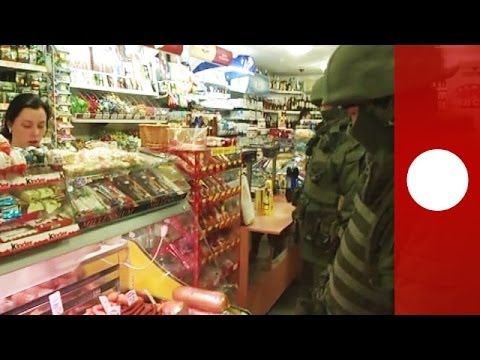 Video: Masked soldiers in Crimea queue up for sausages at grocery store