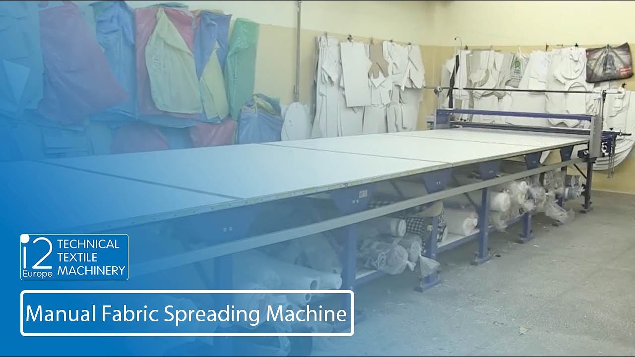 Manual Fabric Spreading Machine - YouTube