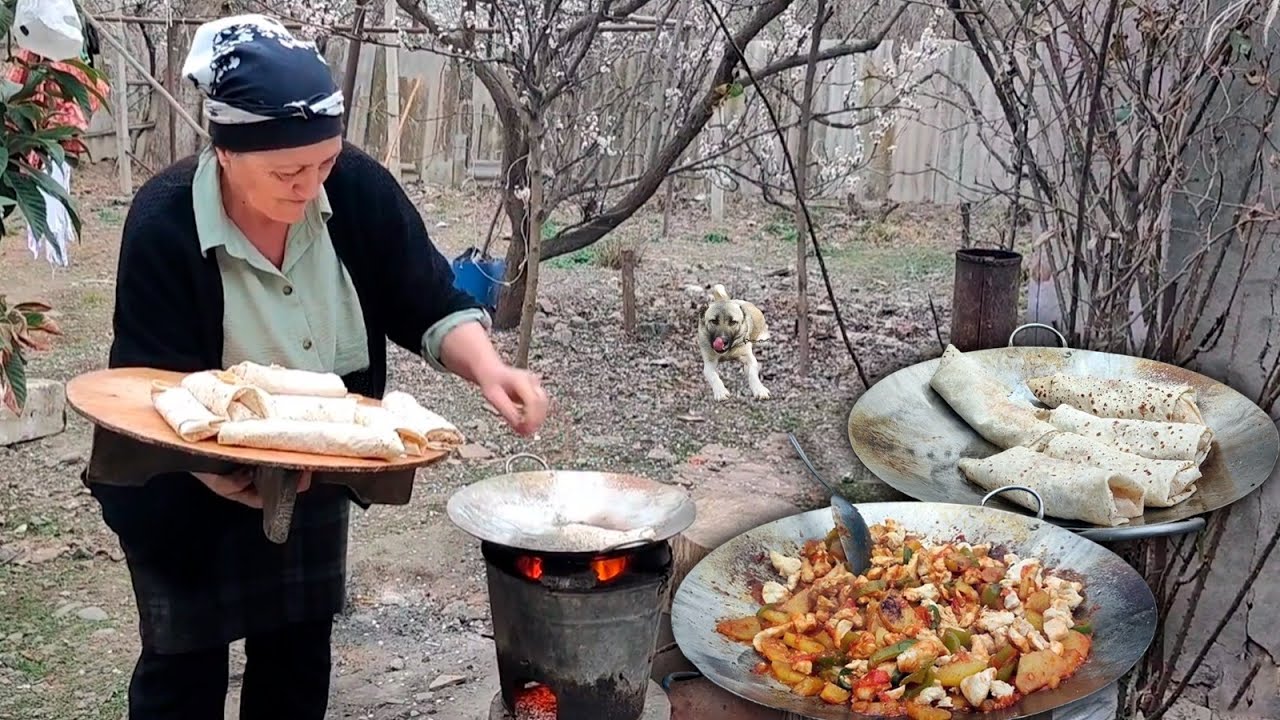 Cooking delicious chicken with potatoes, fresh vegetables on sheet pan ...