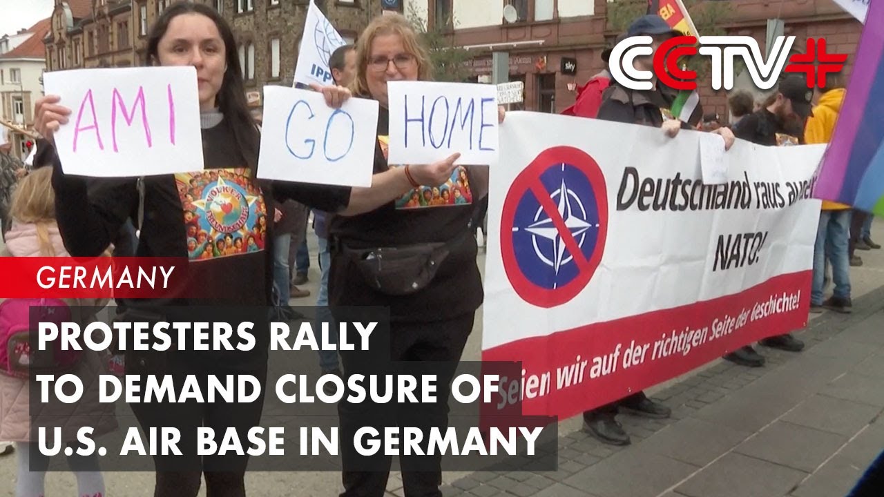 Protesters Rally to Demand Closure of U.S. Air Base in Germany - YouTube
