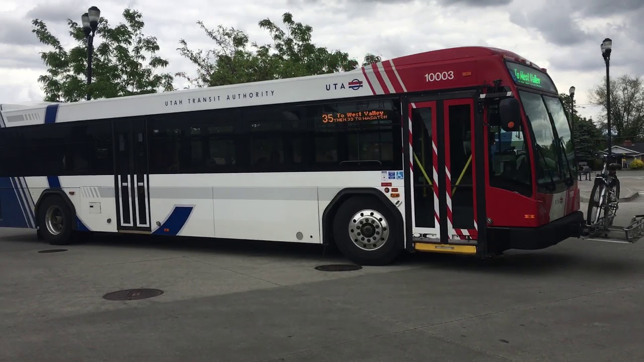 Uta buses 10003 and 10017 pass by west valley central station - YouTube