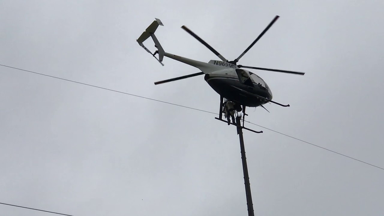 Helicopter lineman - YouTube