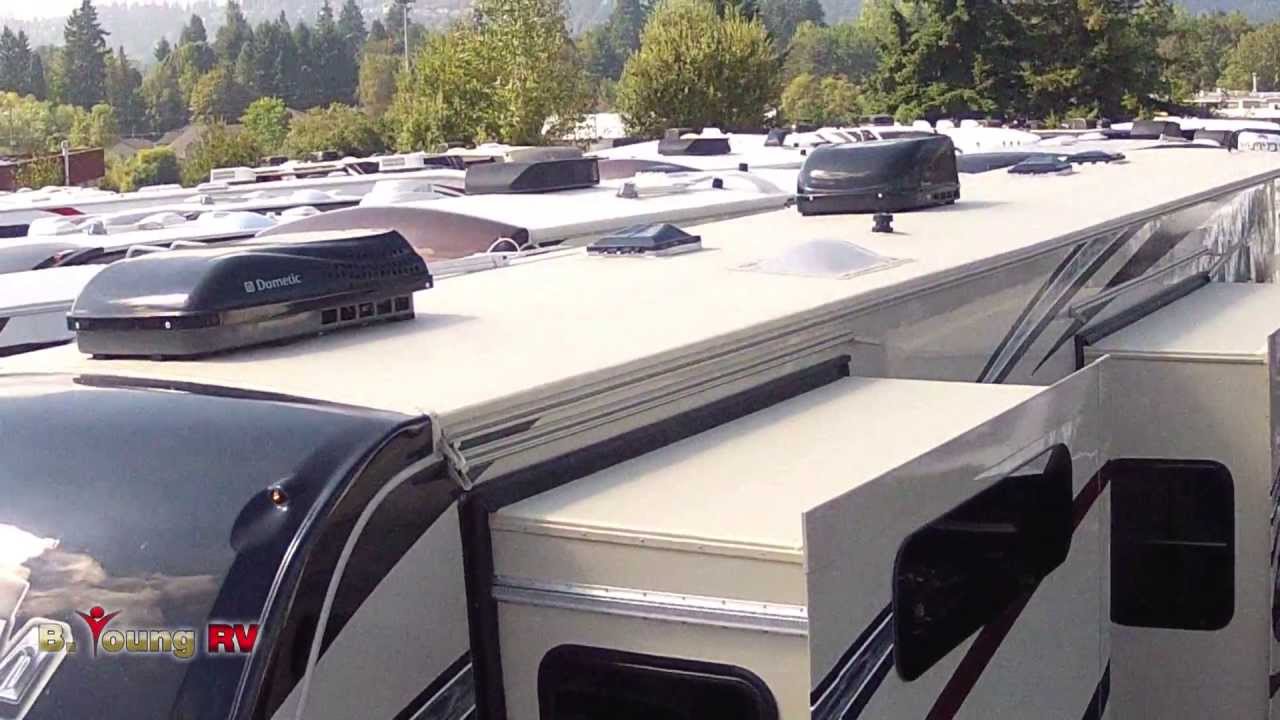 Stock #2845 2014 35 foot Momentum 5th Wheel Toy Hauler by Grand Design ...