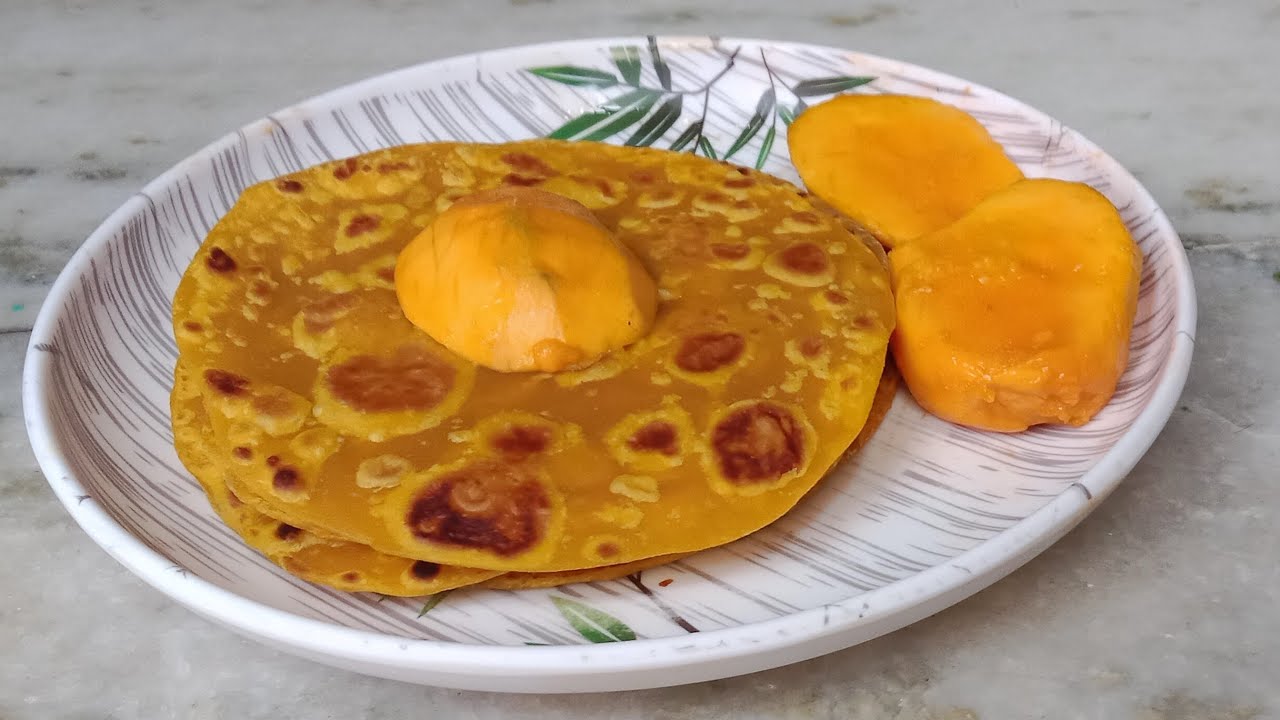 paka aam diye porota recipe পাকা আম দিয়ে বানিয়ে ফেলুন পাকা আমের পরোটা ...