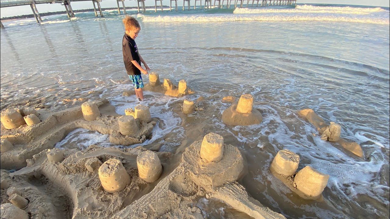 Epic Sandcastle build VS the tide and waves!! - YouTube