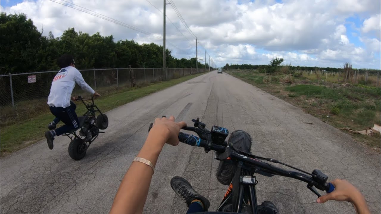 Mini bike wheelies at the farm - YouTube