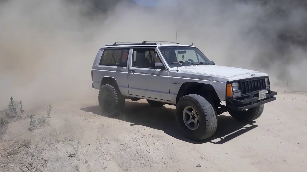 Off roading having fun in my buddies cheap new jeep toy - YouTube