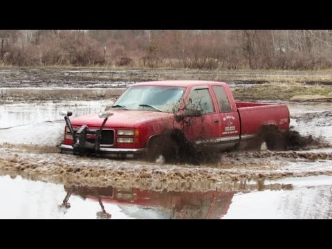 Red GMC Truck Mudding At M13 Mud Bog - YouTube