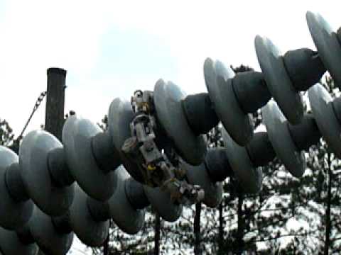 Snake Robot Navigating Insulator - YouTube