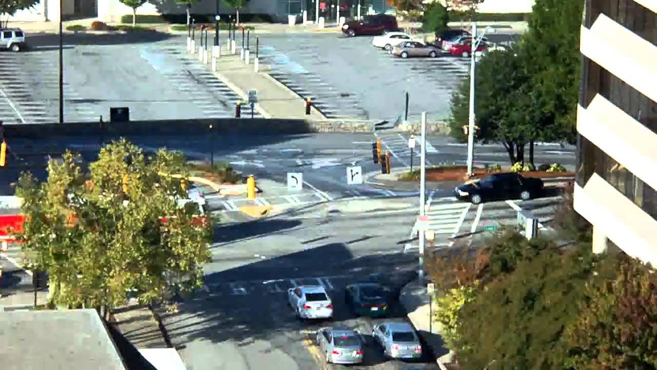 Dalai Lama motorcade secret service convoy video Lenox Rd. Atlanta ...