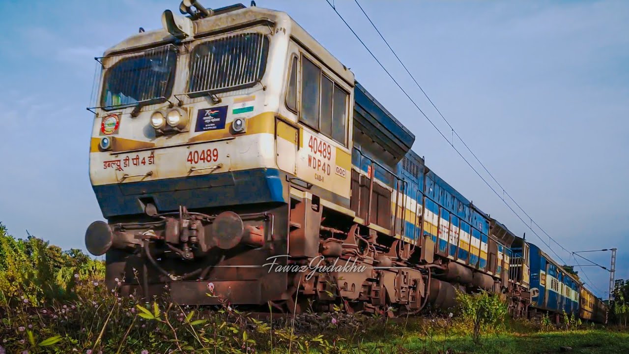 Matsyagandha Express with Golden Rock WDP4D Cruises Past Manki | Konkan ...