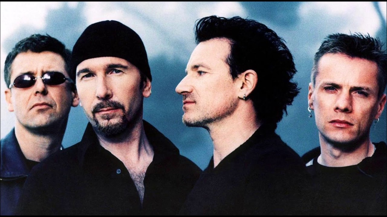 U2 - Elevation (lyrics) - YouTube